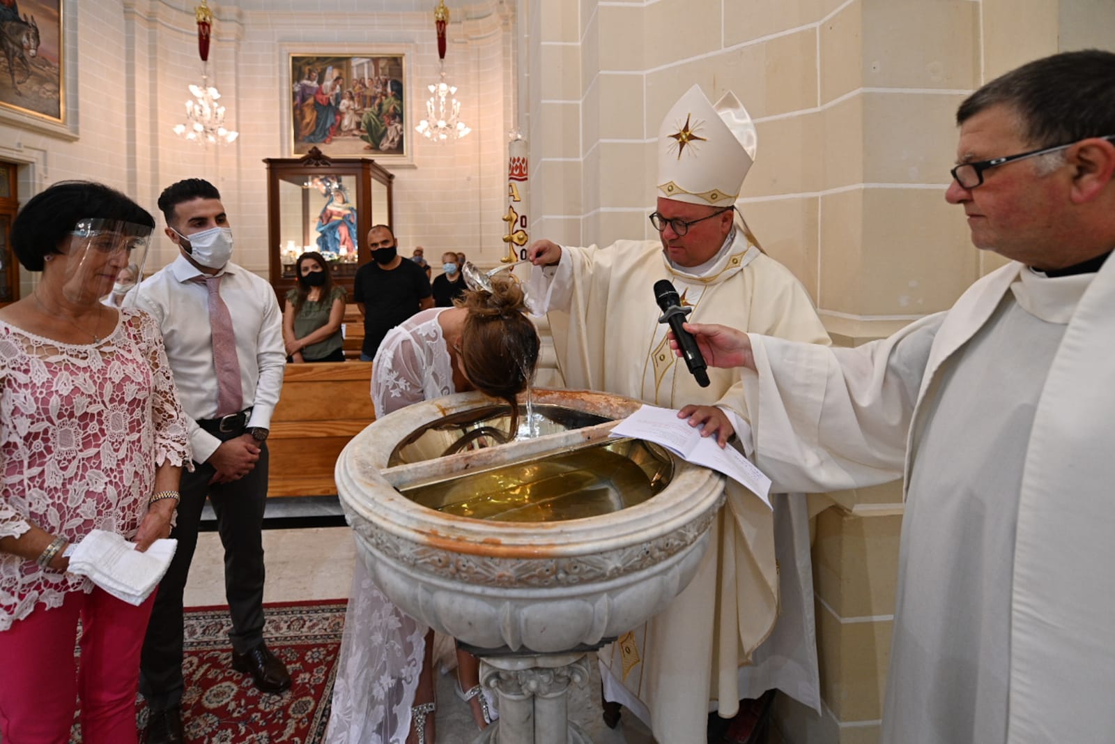 Four adults and a young child baptised – Archdiocese of Malta